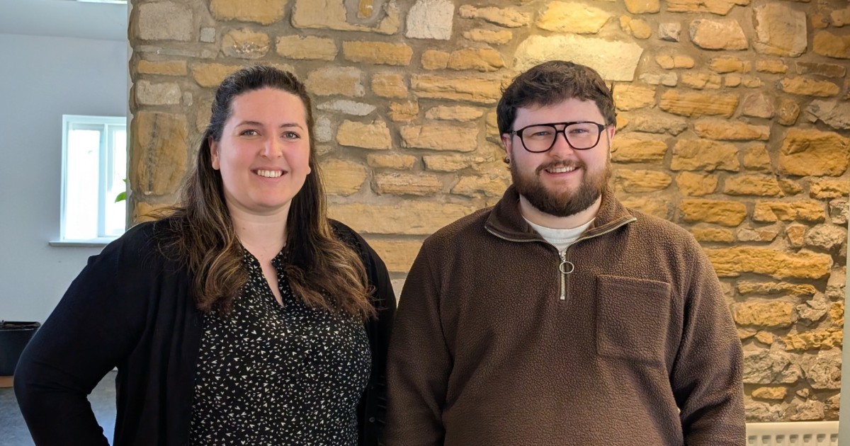 Wilson Mason celebrates two team members completing architecture qual
